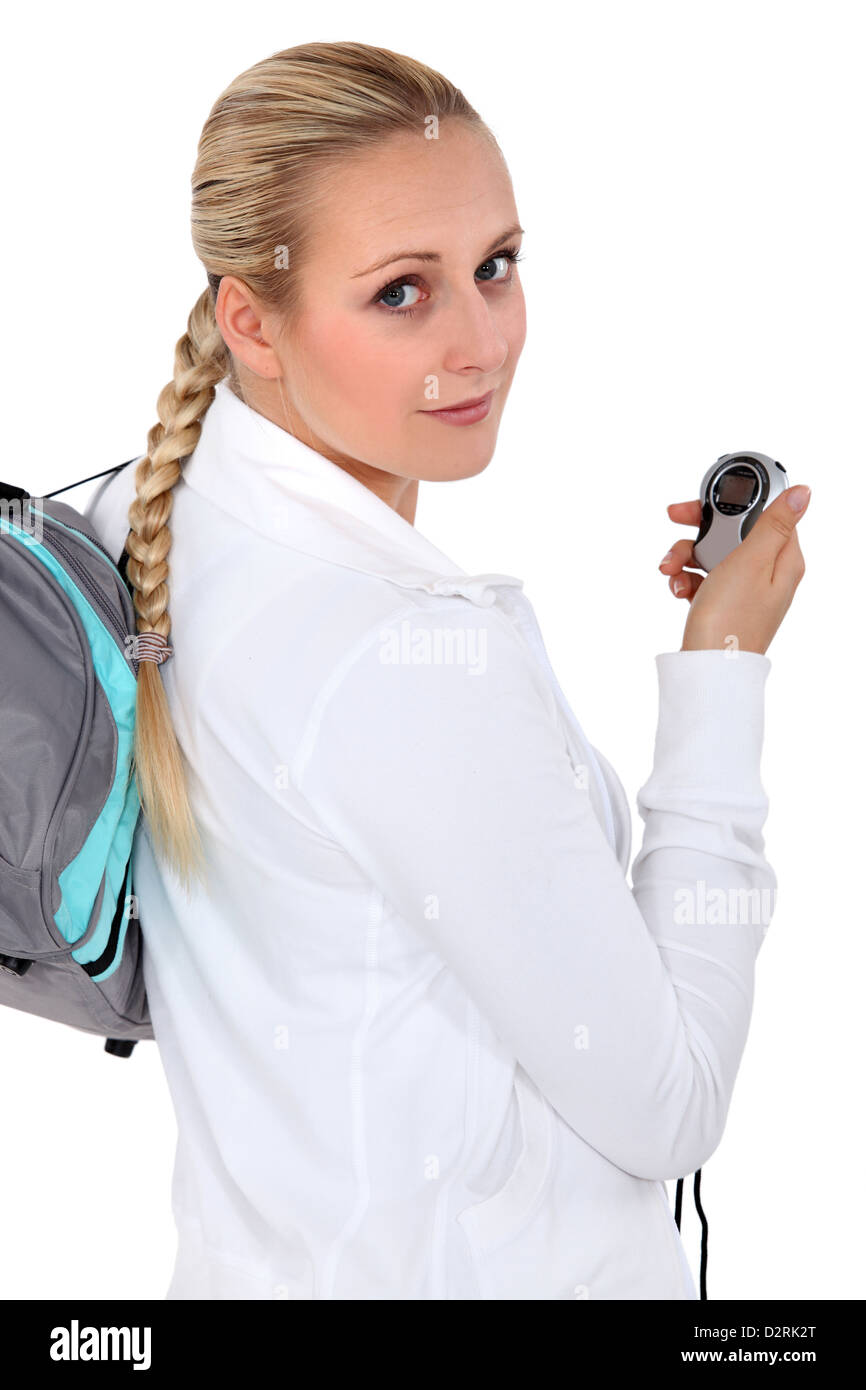 Woman holding a stopwatch hi-res stock photography and images - Alamy