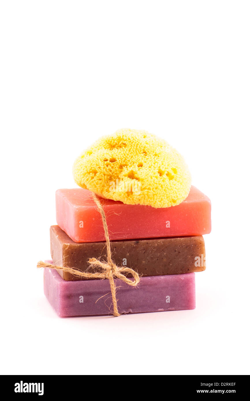 Bricks of handmade soap with natural sea sponge isolated on white. SPA ...