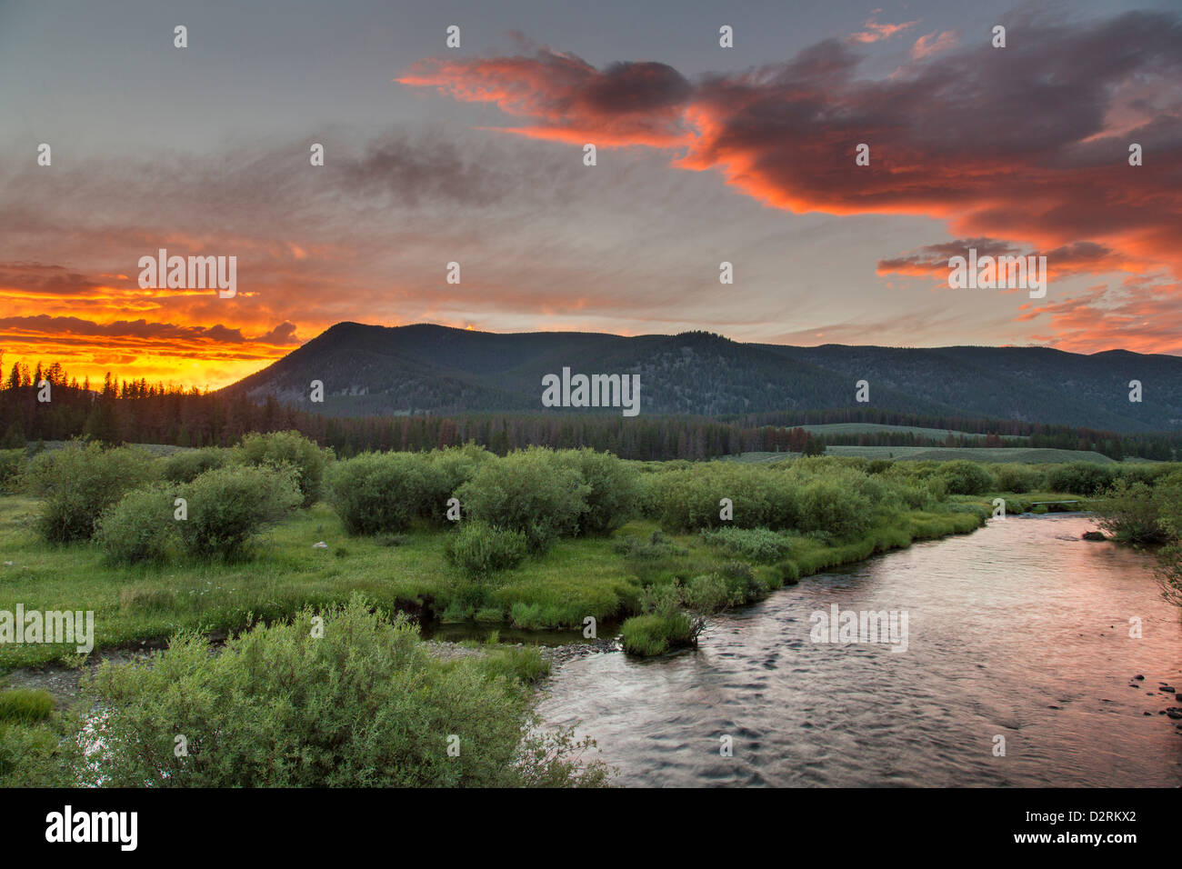 Vivid sunset clouds over the Wise River in the Pioneer Mountains in the ...