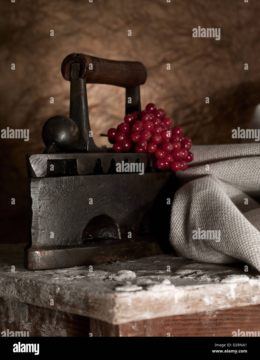 Retro still life with old rusty iron and textile Stock Photo - Alamy