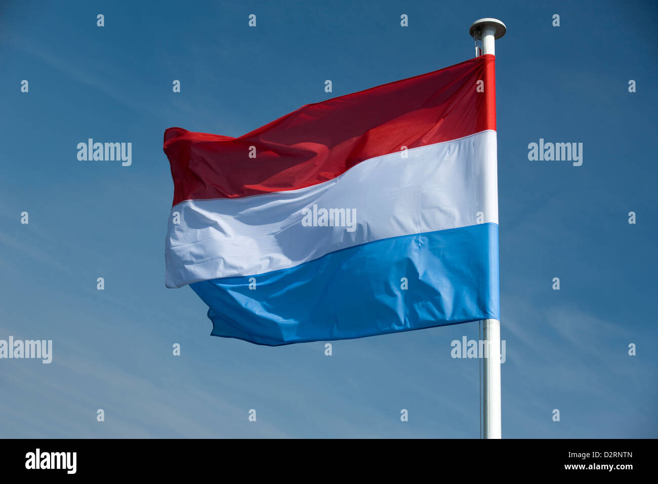 DUTCH FLAG FLYING ON FLAGPOLE Stock Photo - Alamy