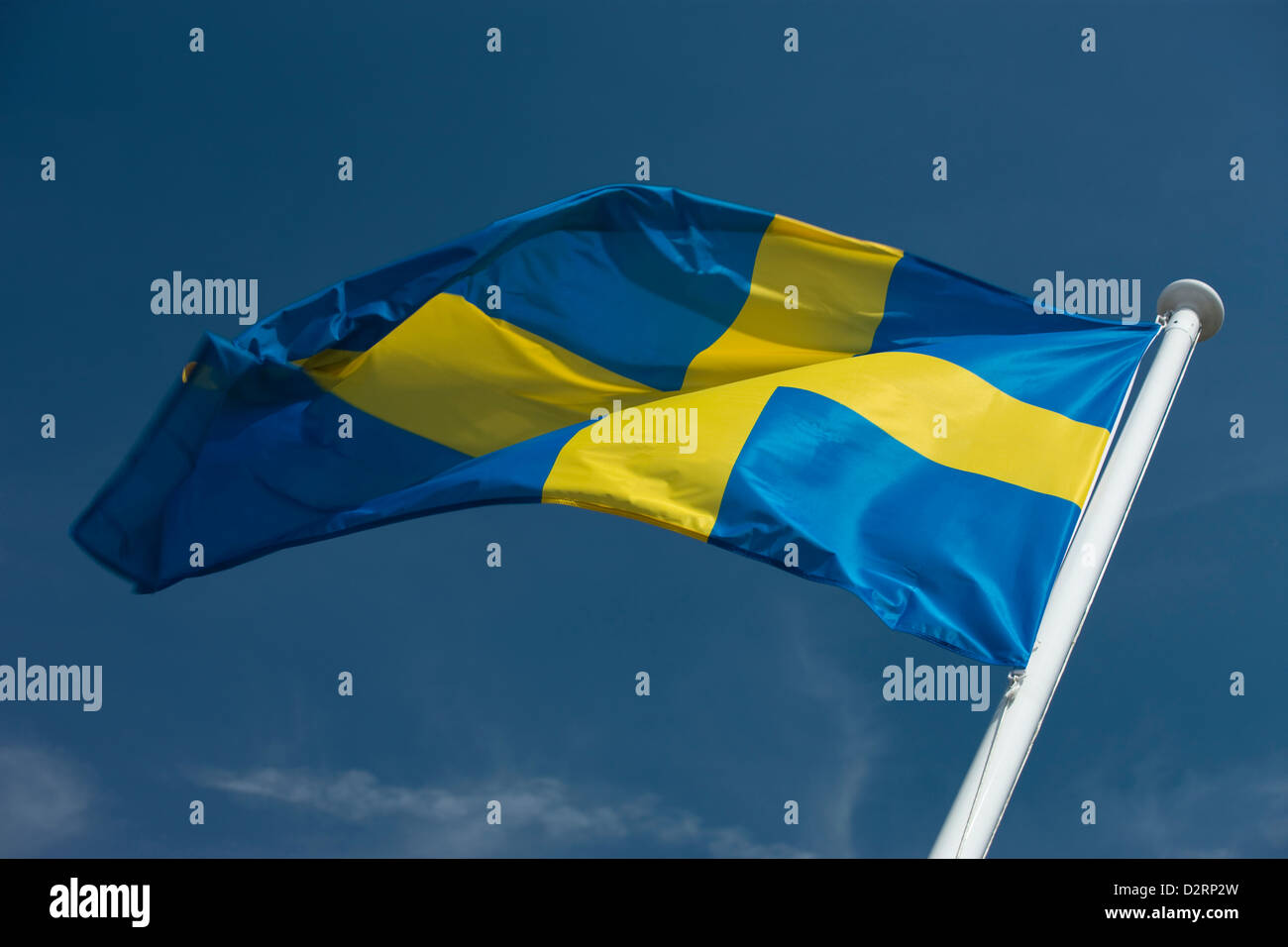 SWEDISH FLAG FLYING ON FLAGPOLE Stock Photo - Alamy