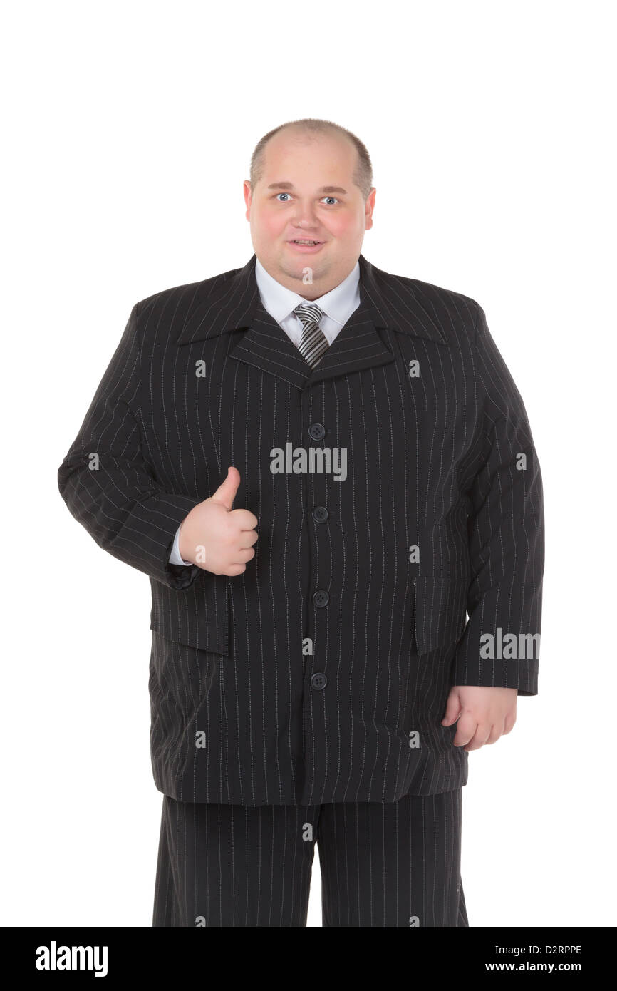 Elegant very fat man in a black suit shows thumb-up, on white ...