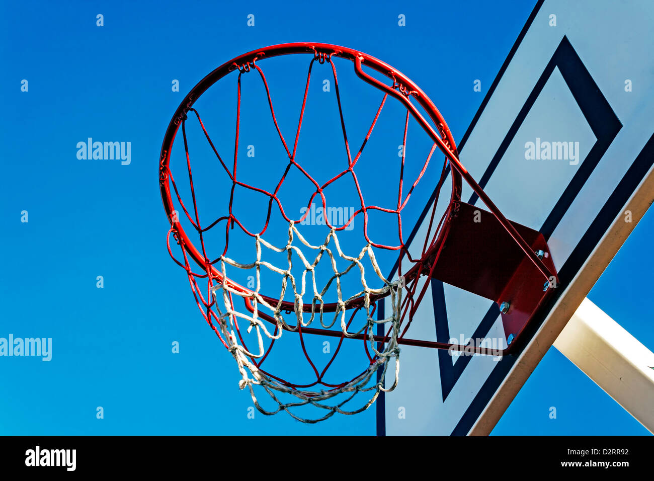 Panel basketball hoop under a blue sky Stock Photo - Alamy