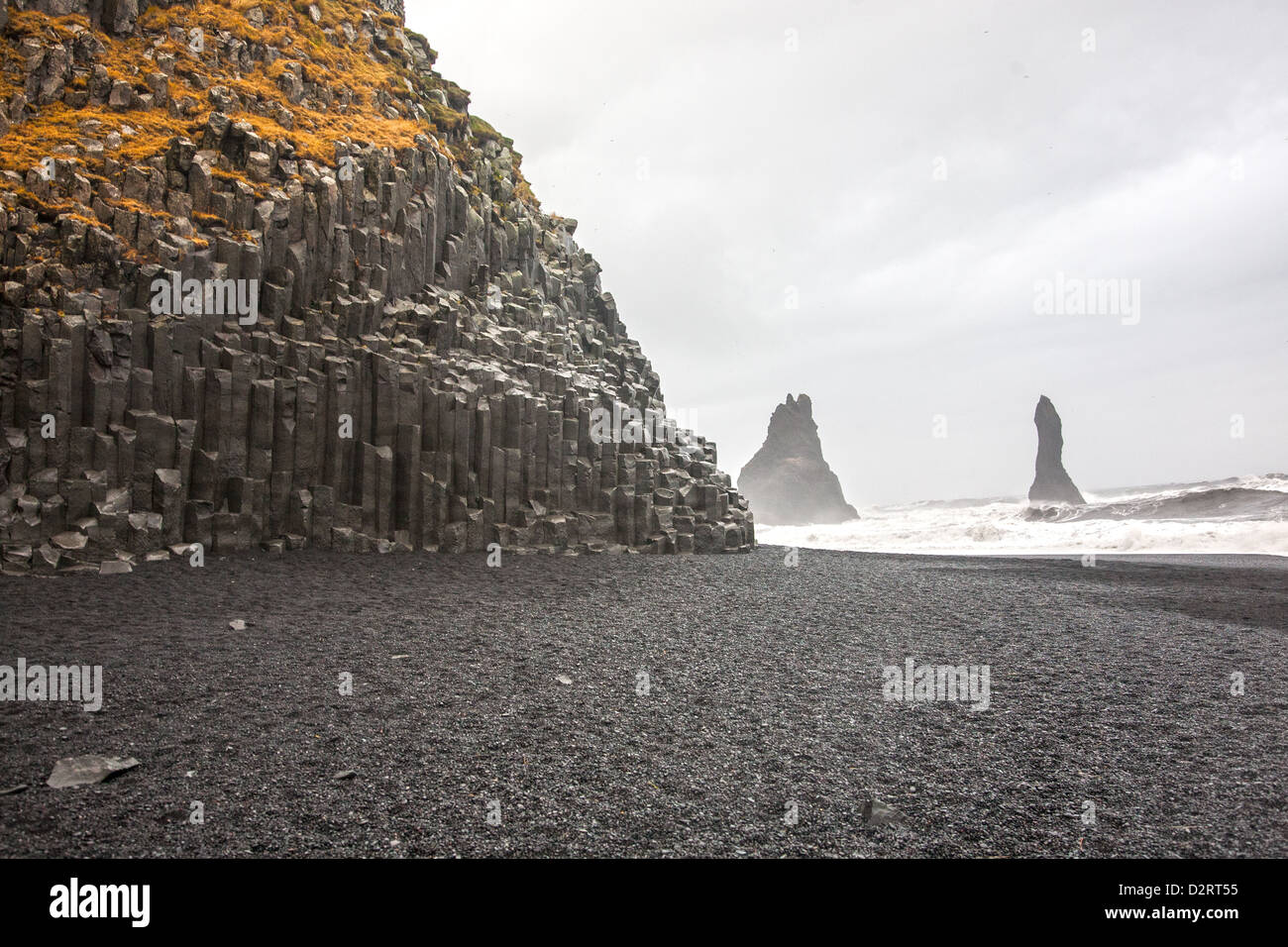 foot of wet grey basalt steps columns iceland Stock Photo - Alamy