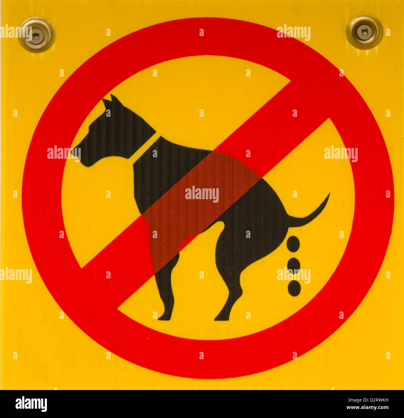 A sign with the symbol of a dog pooping with a mark through it is ...