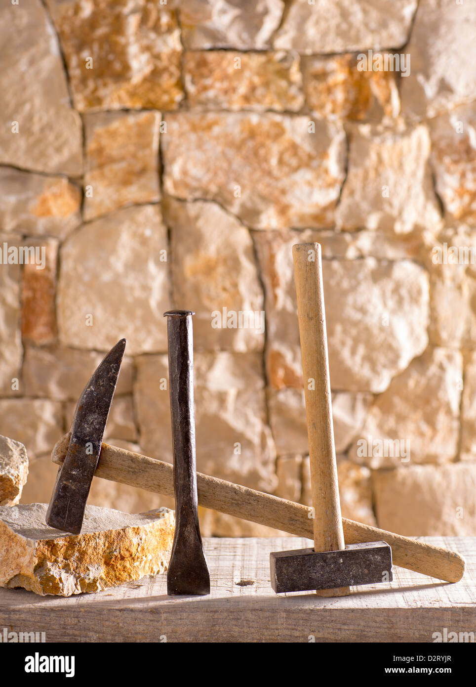 Hammer mason tools of stonecutter masonry work in a contruction stone ...
