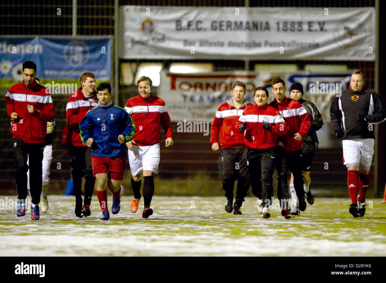 Players of the first men's team of BFC Germania 1888 walk across the ...