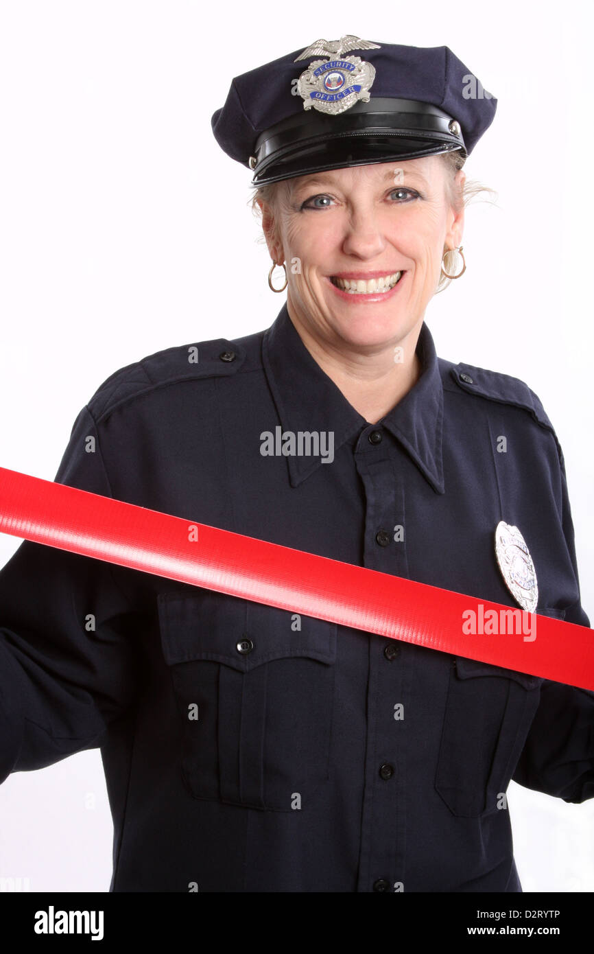 A woman security guard with red tape Stock Photo - Alamy