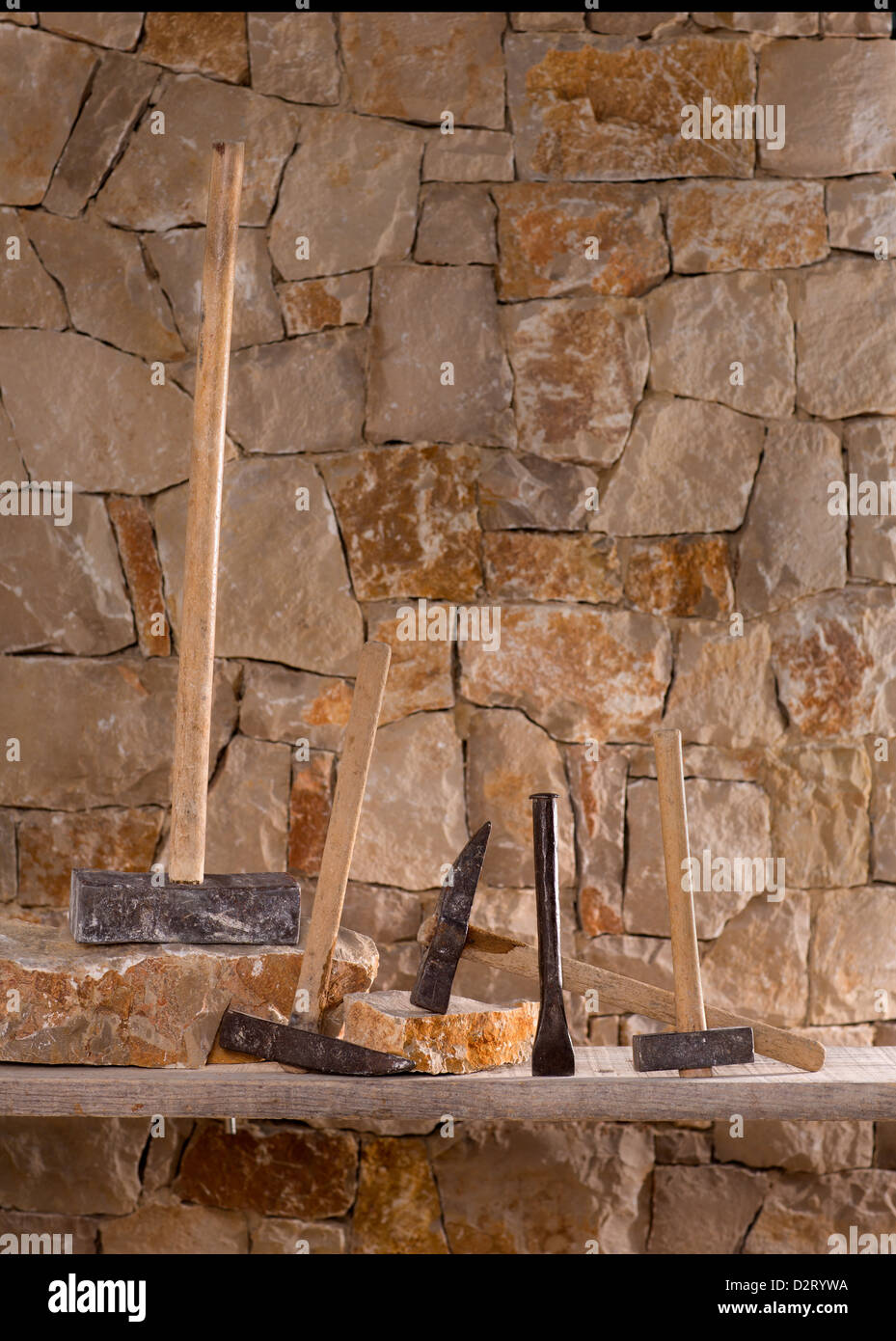 Hammer mason tools of stonecutter masonry work in a contruction stone ...