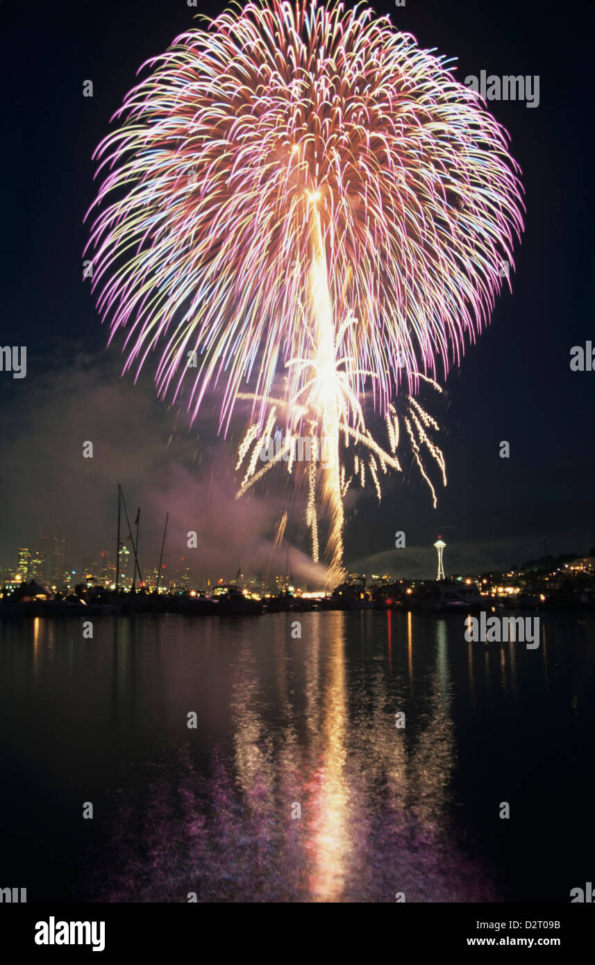 WA, Seattle, Fireworks on July 4th, at Gasworks Park; Space Needle in ...