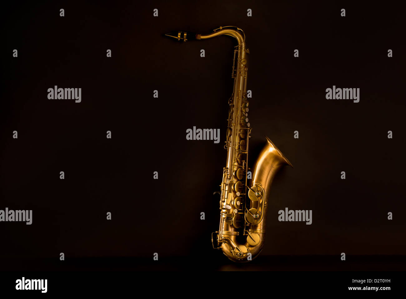 Sax golden tenor saxophone in black background Stock Photo - Alamy
