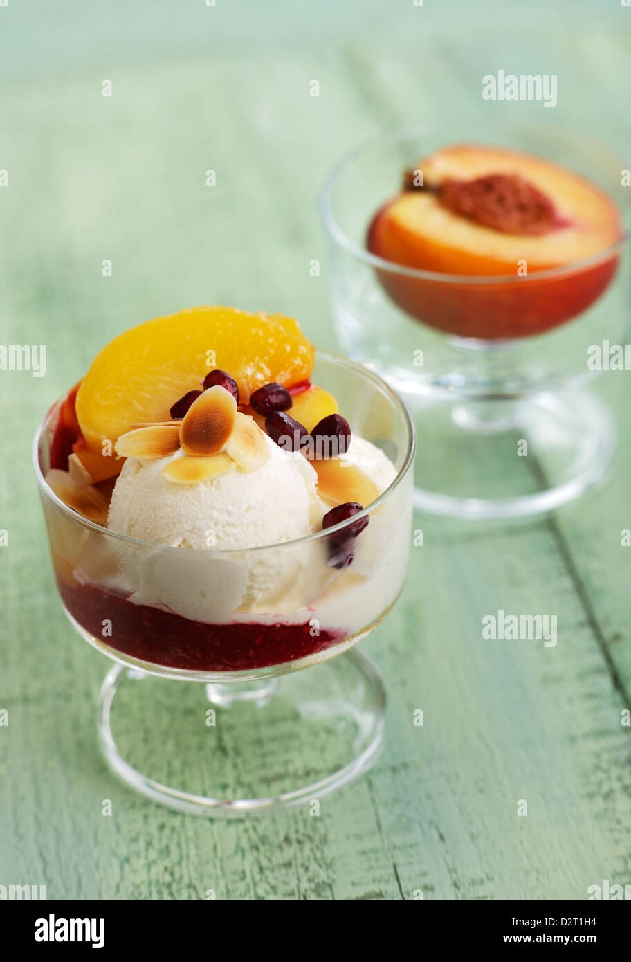 Peach Melba: vanilla ice cream with fresh peach slices and raspberry ...