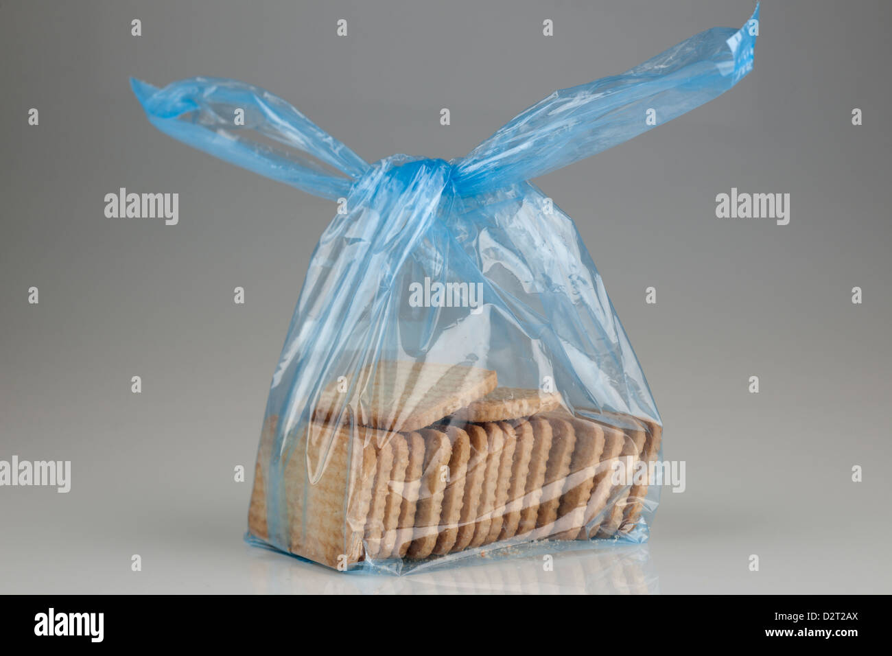 Plastic bag full of biscuits Stock Photo - Alamy
