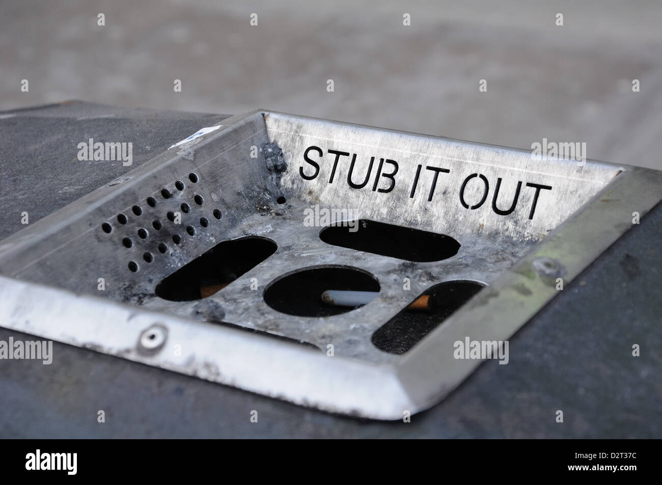 Extinguished dirty ashtray giving up hi-res stock photography and ...