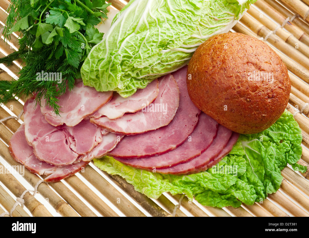 Beautiful sliced food arrangement of meat, bread and vegetables ...