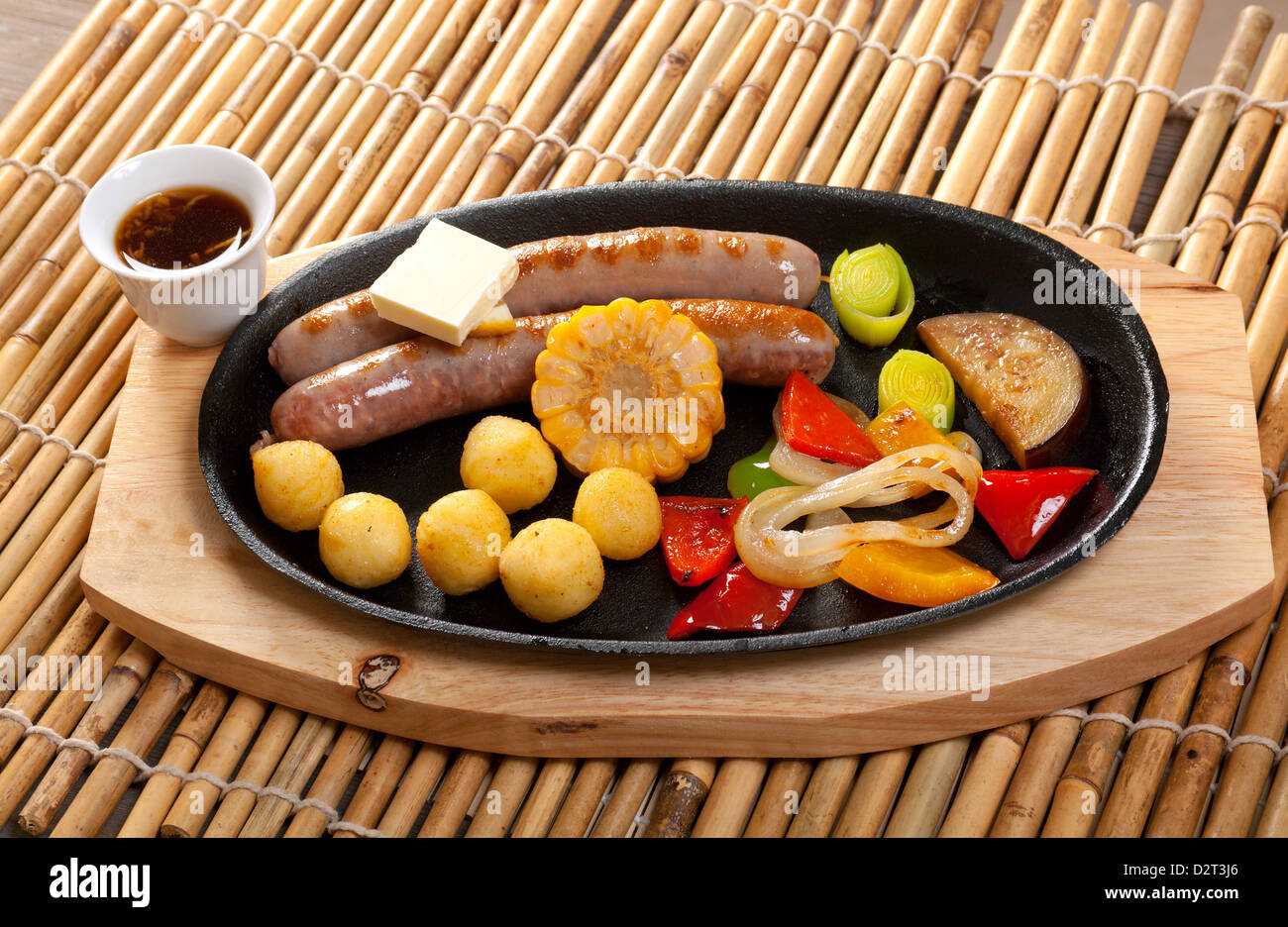 Japanese cuisine .Sausage making roasted with vegetable Stock Photo - Alamy
