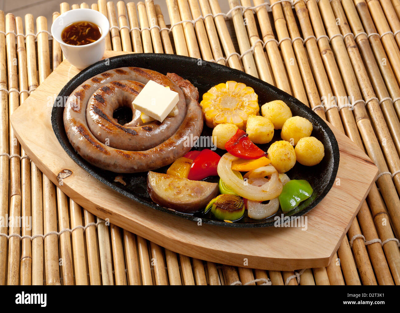Japanese cuisine .Sausage making roasted with vegetable Stock Photo - Alamy