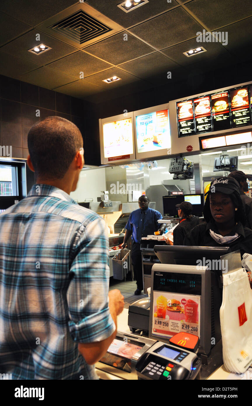 McDonald's fast food junk restaurant waiting queue Stock Photo - Alamy