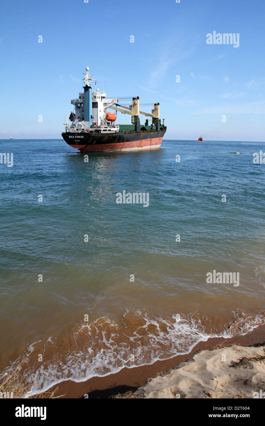 Cargo ship aground in a beach Stock Photo - Alamy