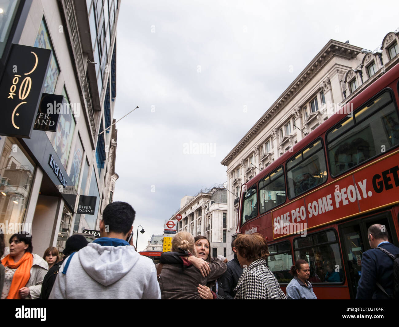 a friendly hug on a crowd street Stock Photo - Alamy
