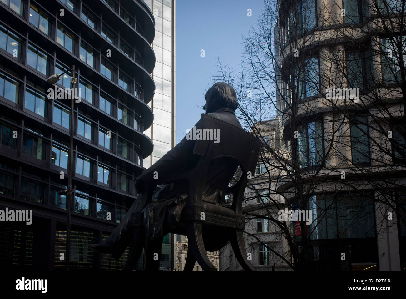 The rear of the statue of George Peabody and modern offices in the ...