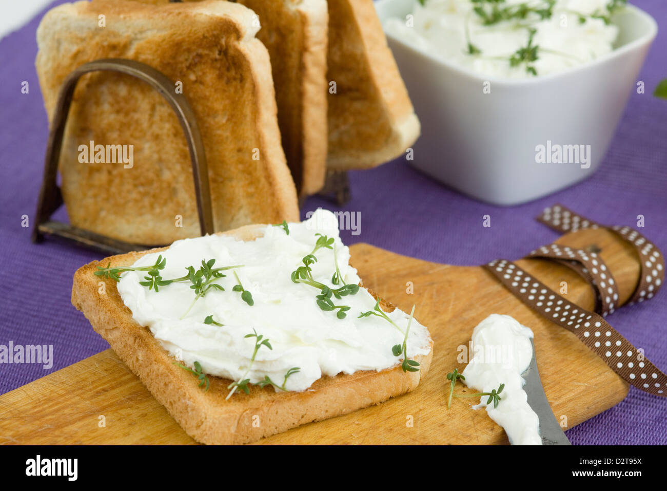 Toast with cream cheese Stock Photo - Alamy