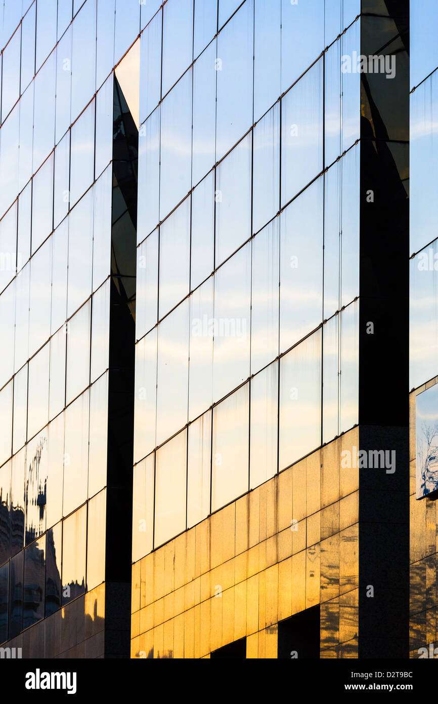 Sky and twilight reflection on corporate building facade Stock Photo ...