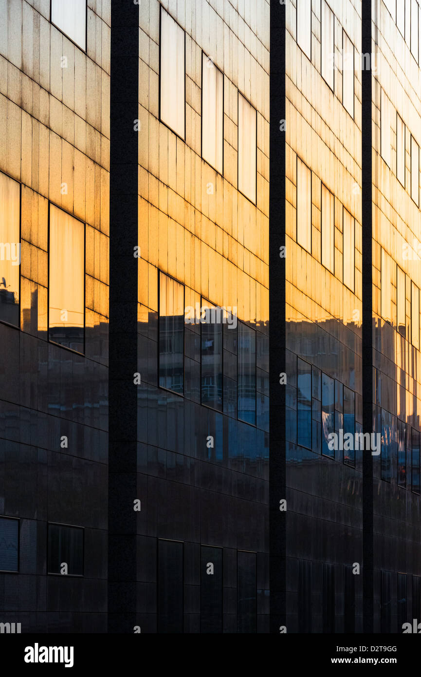 Sky and sunset reflection on corporate building facade Stock Photo - Alamy