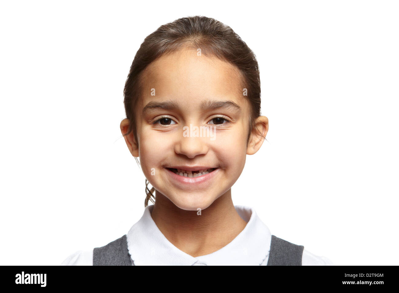 8 year old school girl smiling on white background Stock Photo - Alamy