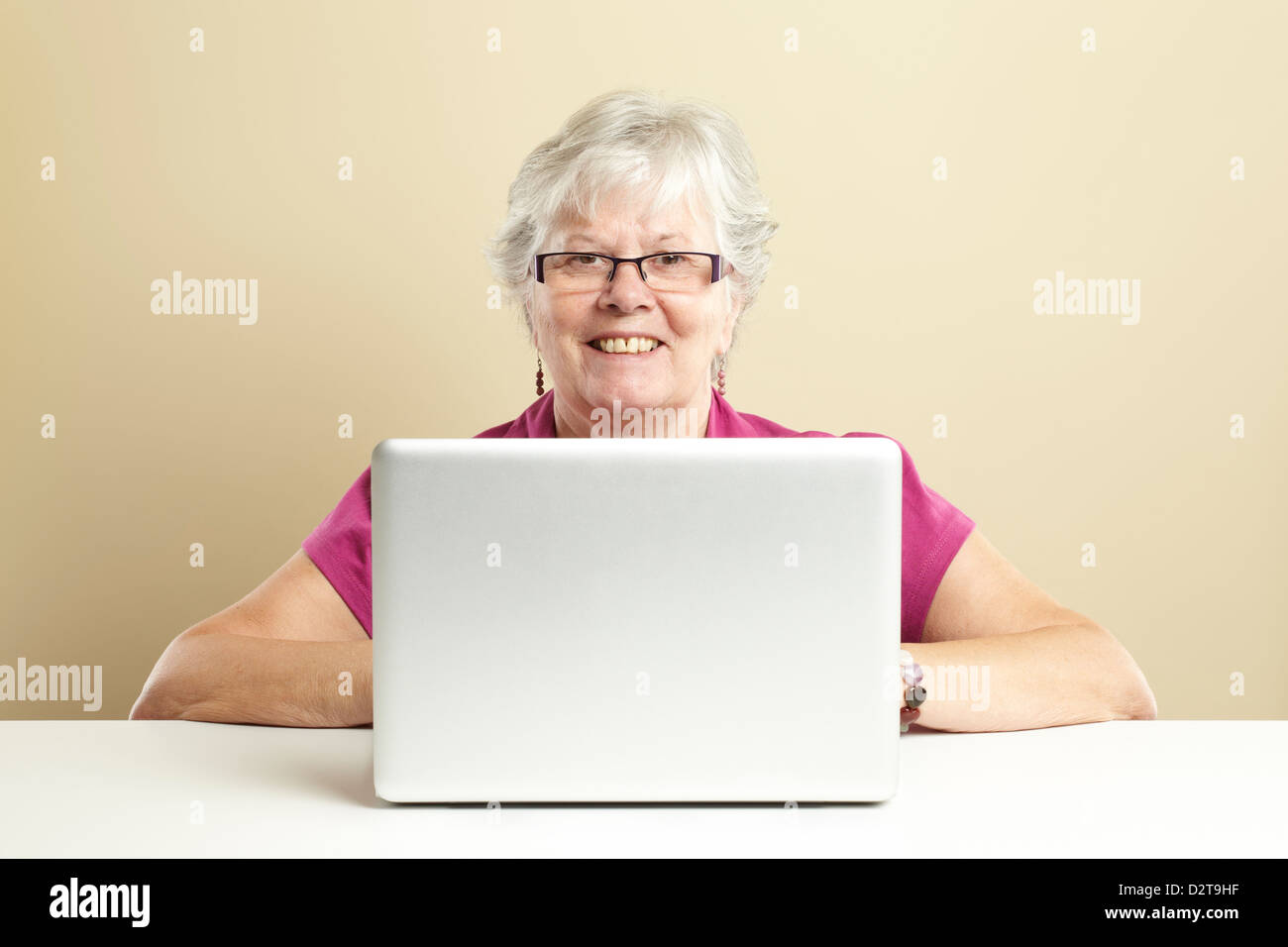 Elderly woman joyfully using hi-res stock photography and images - Alamy