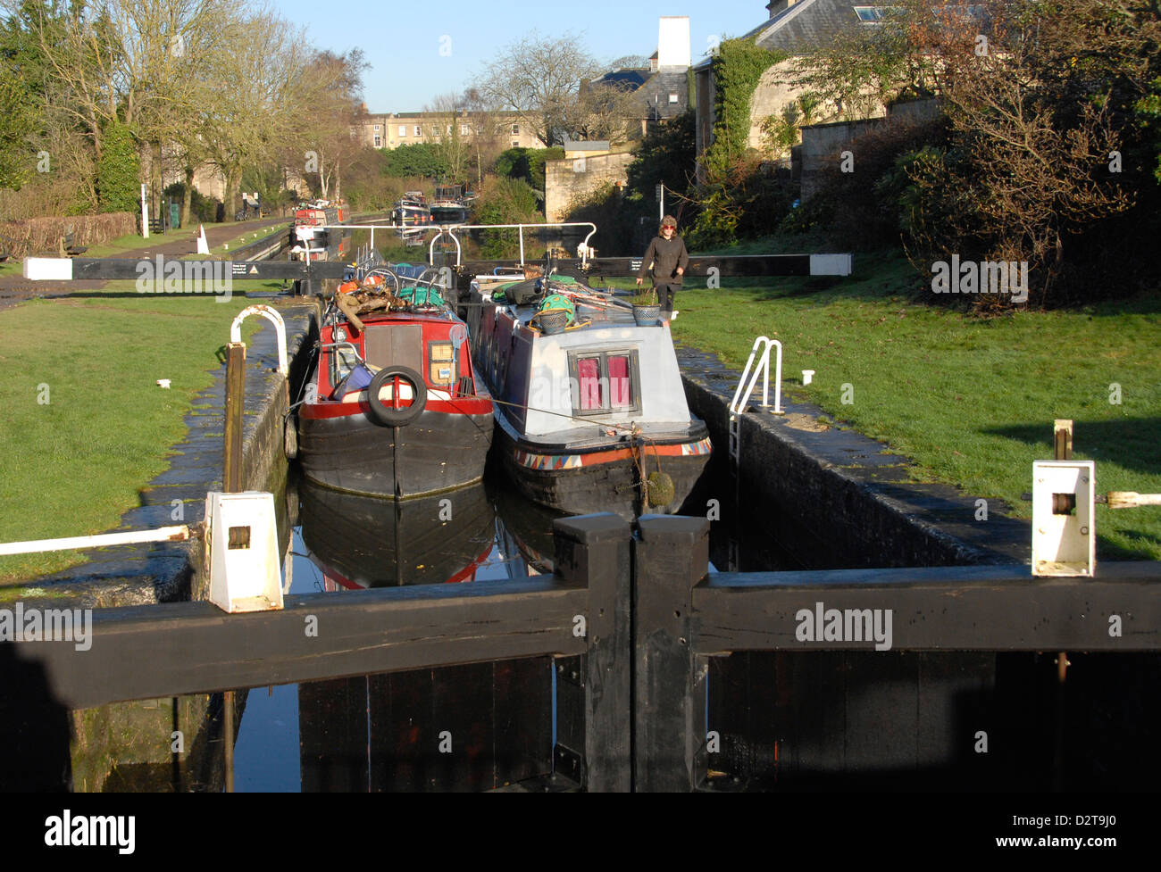 Barges and locks on the Kennet and Avon Canal in Bath, Somerset, UK ...