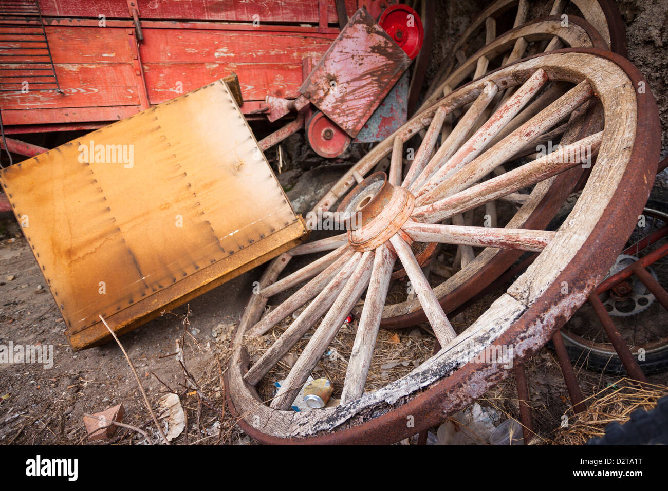 Spain, Catalonia, Pyrenees, Gósol. Wooden wheels and farming equipment ...