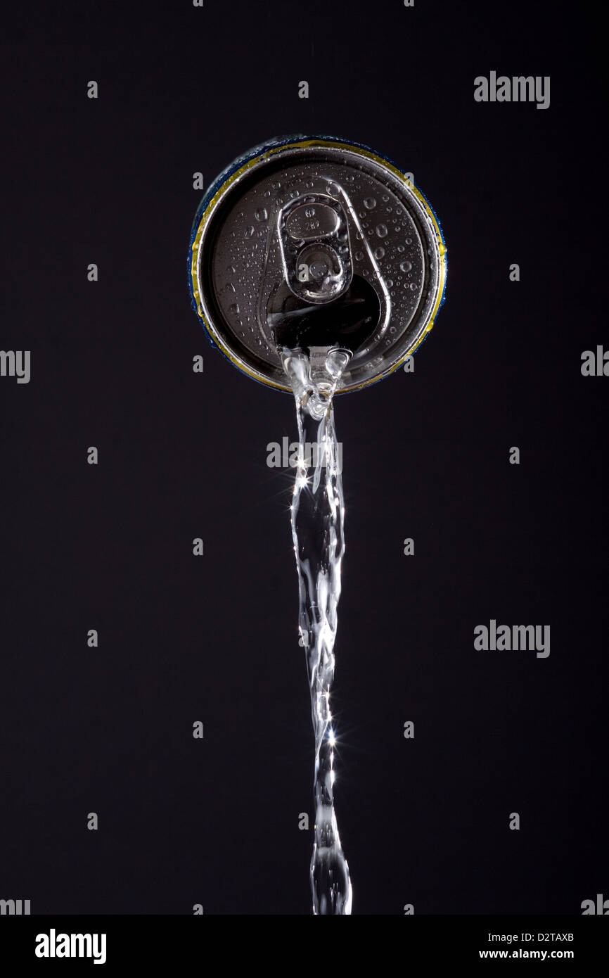 Beverage can is poured Stock Photo - Alamy