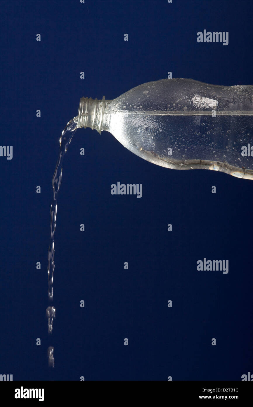 Water is poured from a plastic bottle Stock Photo - Alamy