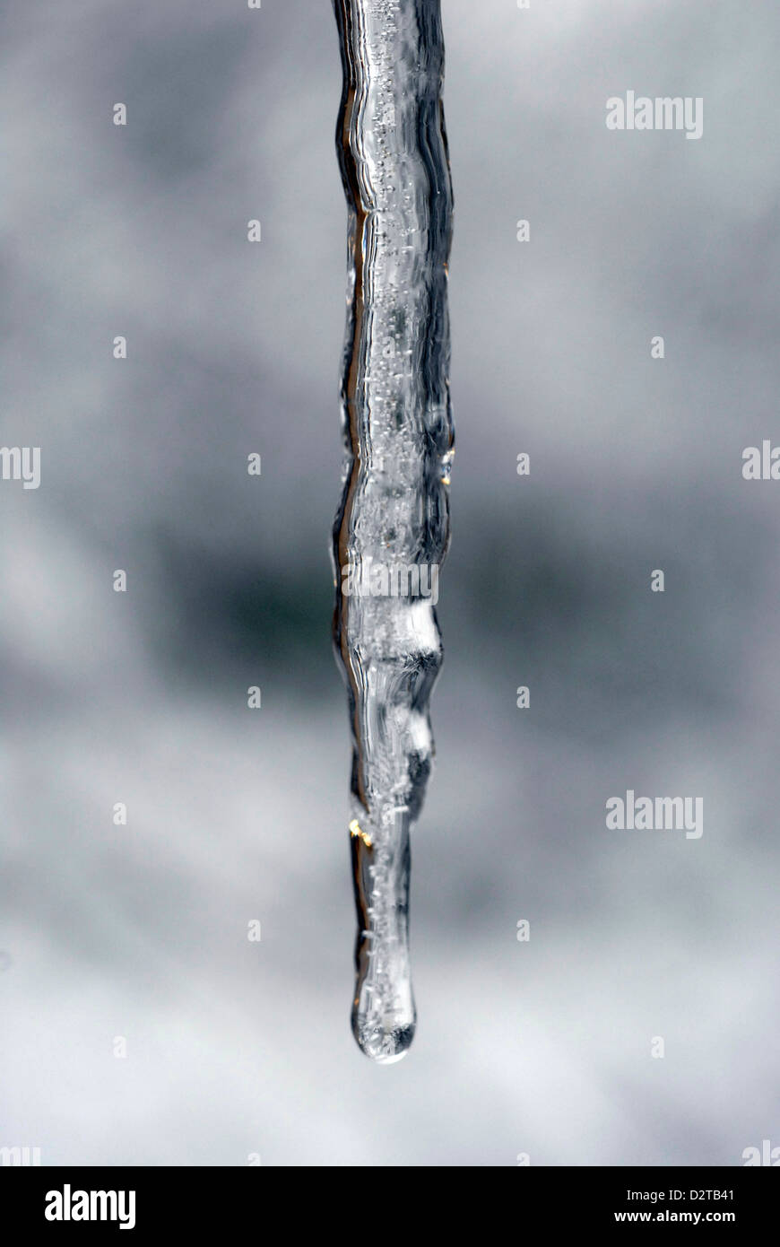 Frozen icicles suspended from a window frame in winter.UK Stock Photo ...