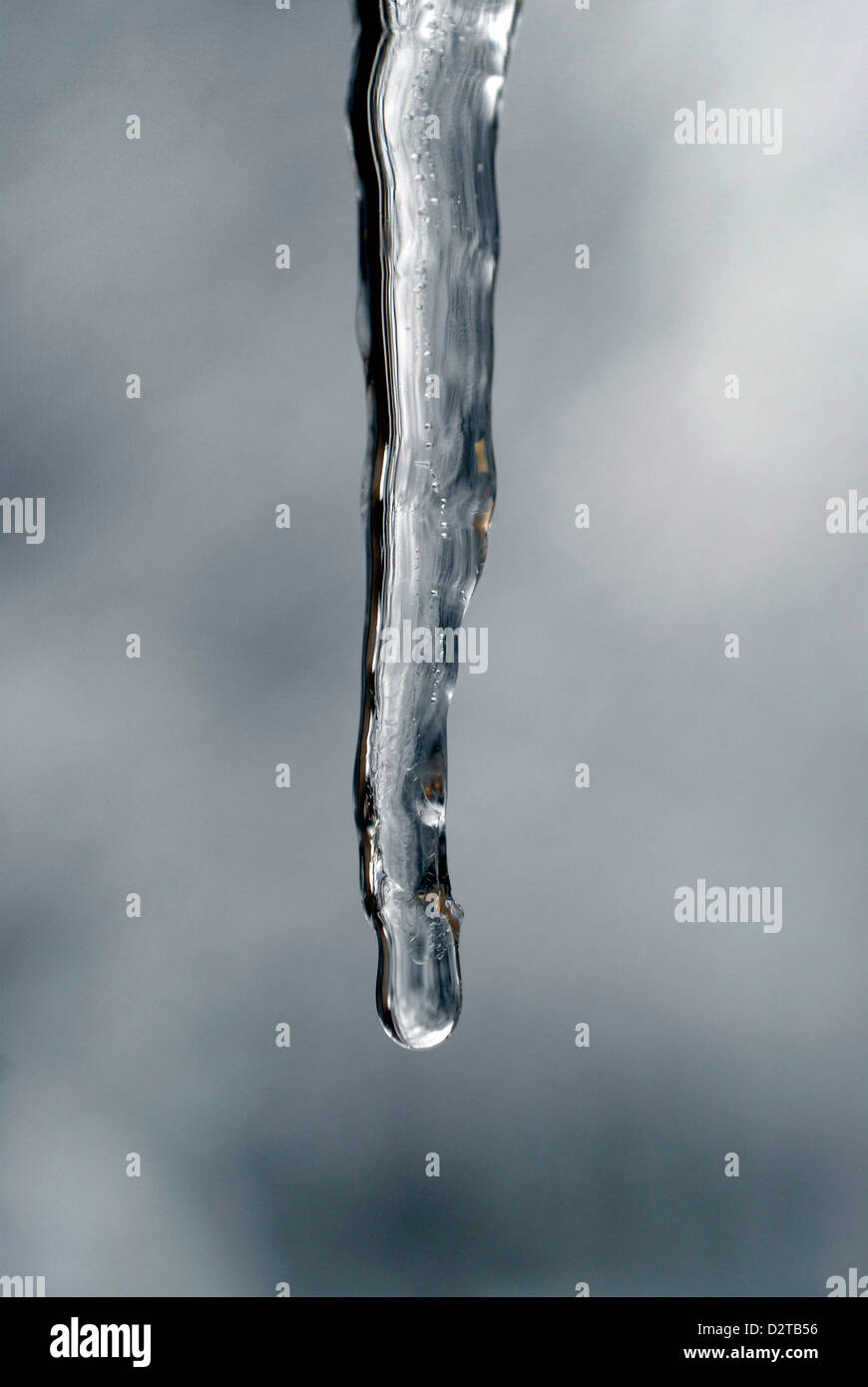 Frozen icicles suspended from a window frame in winter.UK Stock Photo ...