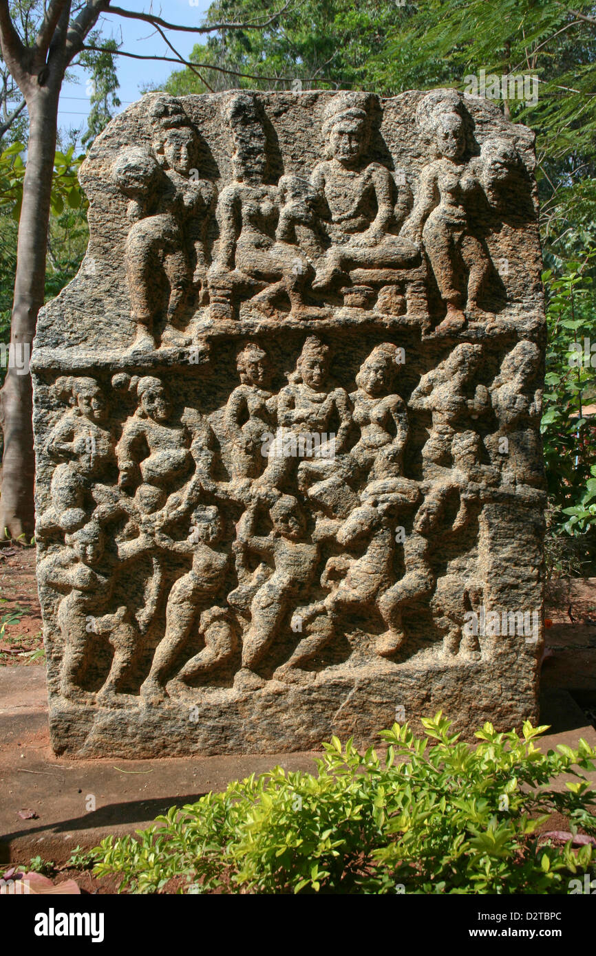 Stone with bas relief sculpture installed in folk art museum Stock ...