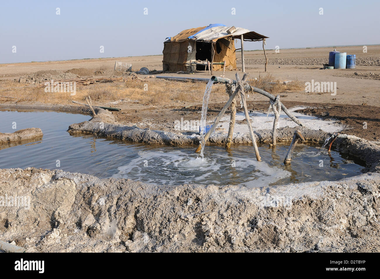 Salt making pit and salt worker's home, Gujarat, India, Asia Stock ...