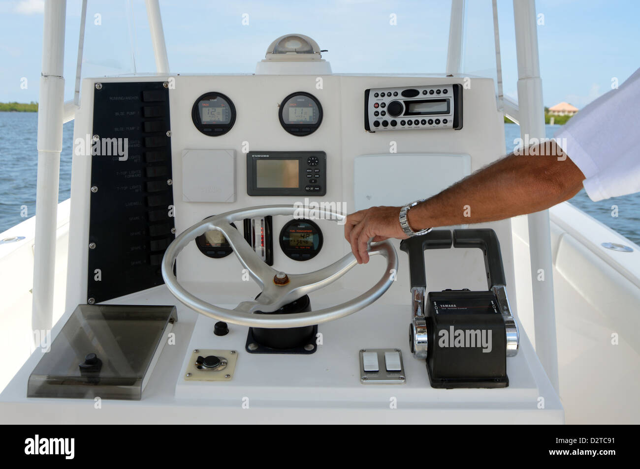 Steering a Sports Fishing Boat Stock Photo - Alamy