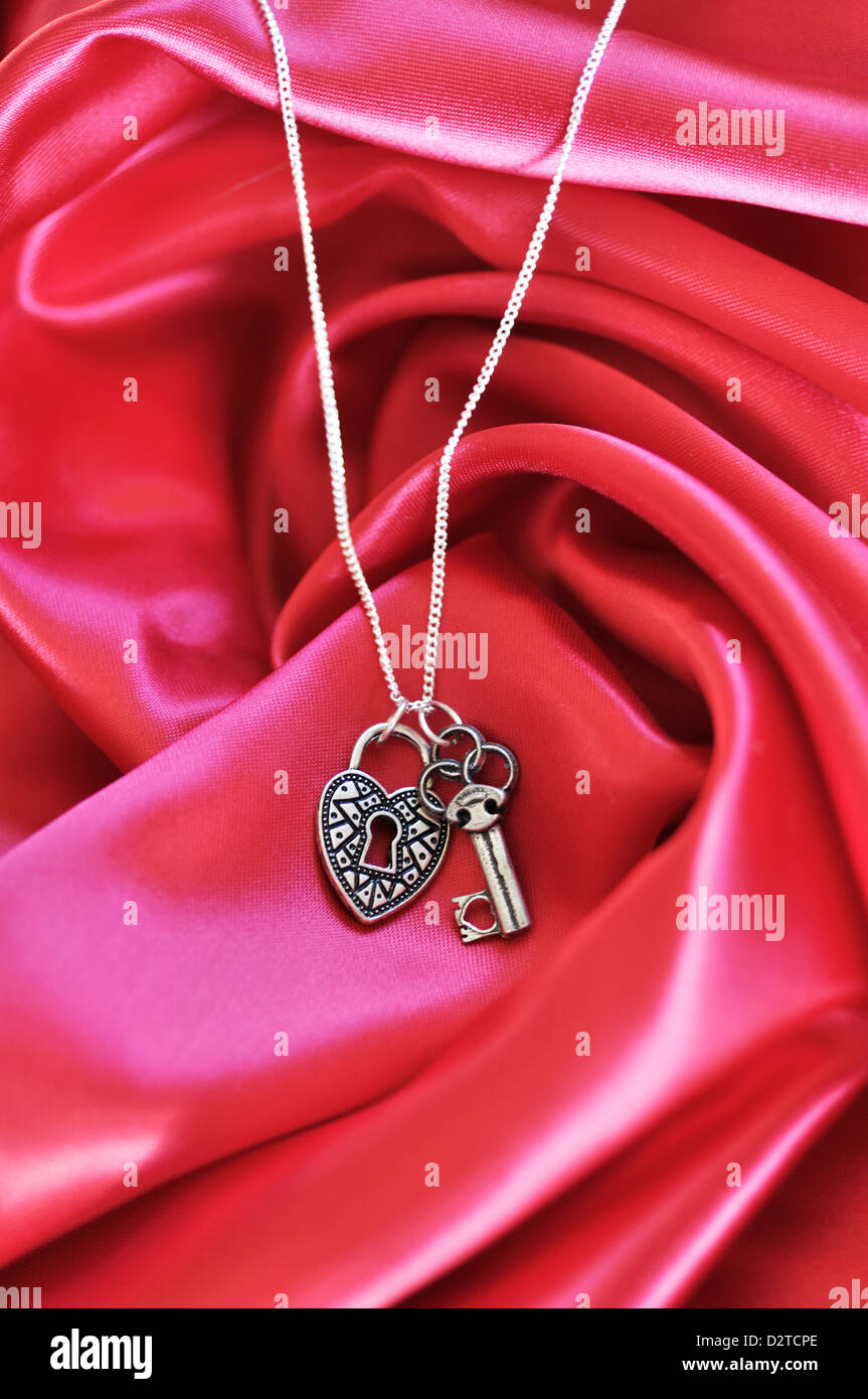 Chain and pendant - lock and key Stock Photo - Alamy