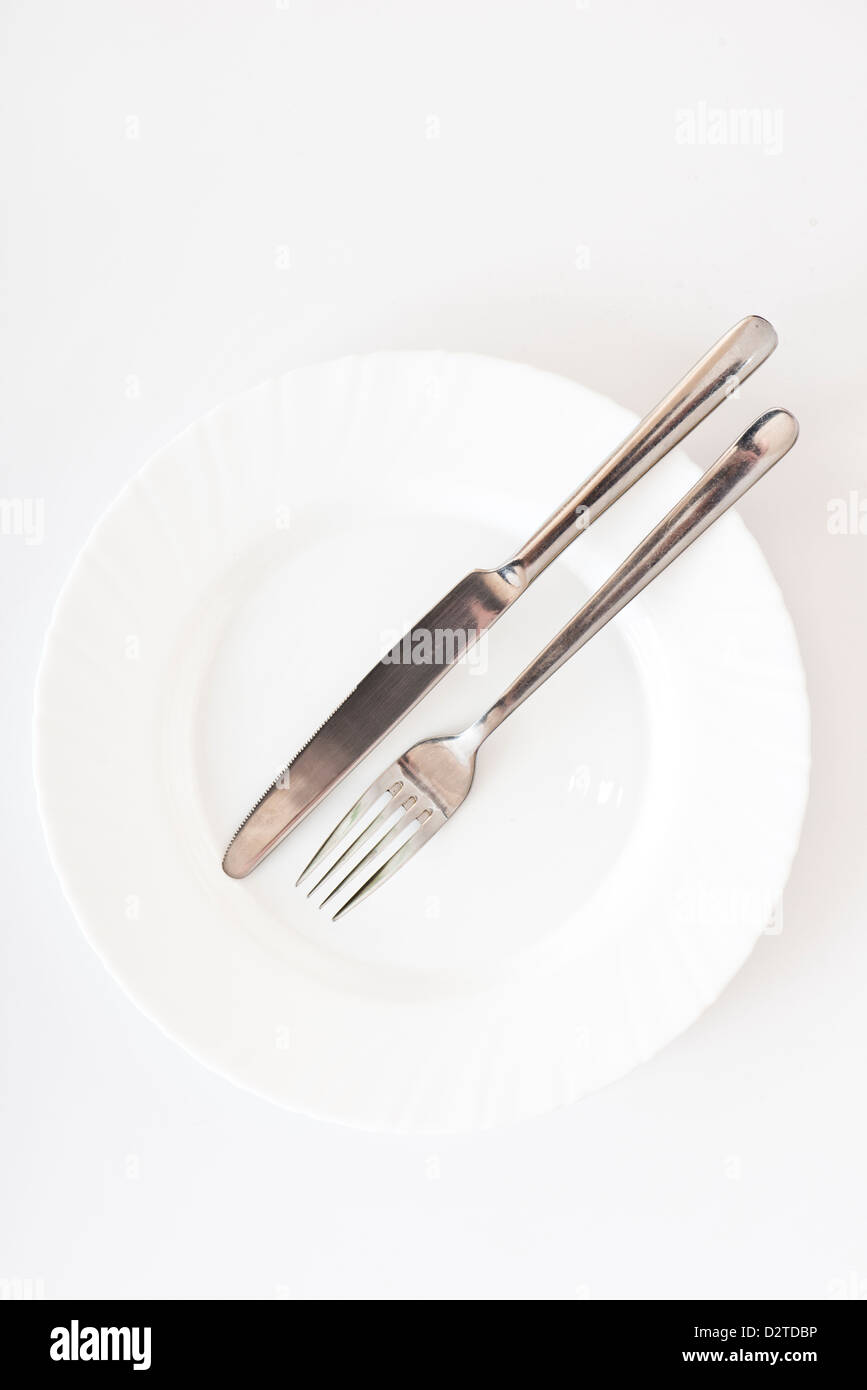 China plate and cutlery isolated hi-res stock photography and images ...