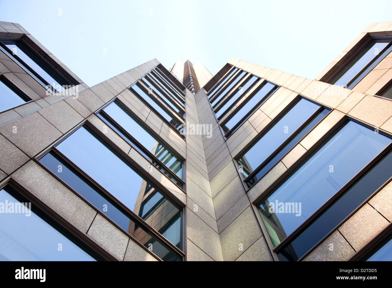 office building with blue sky reflected in windows Stock Photo - Alamy