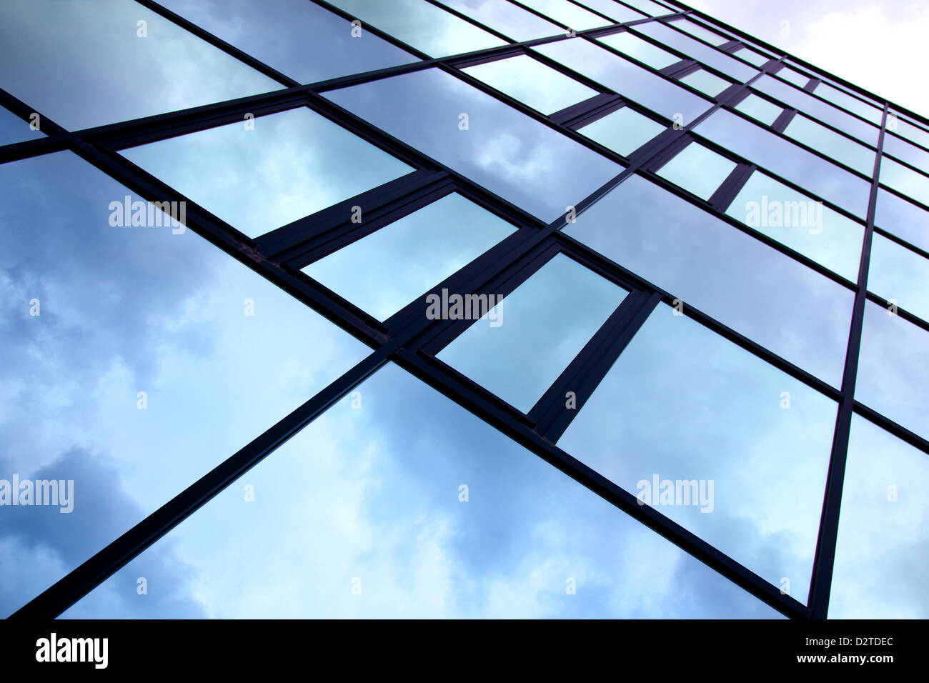 facade of office building with overcast sky reflected diagonally Stock ...