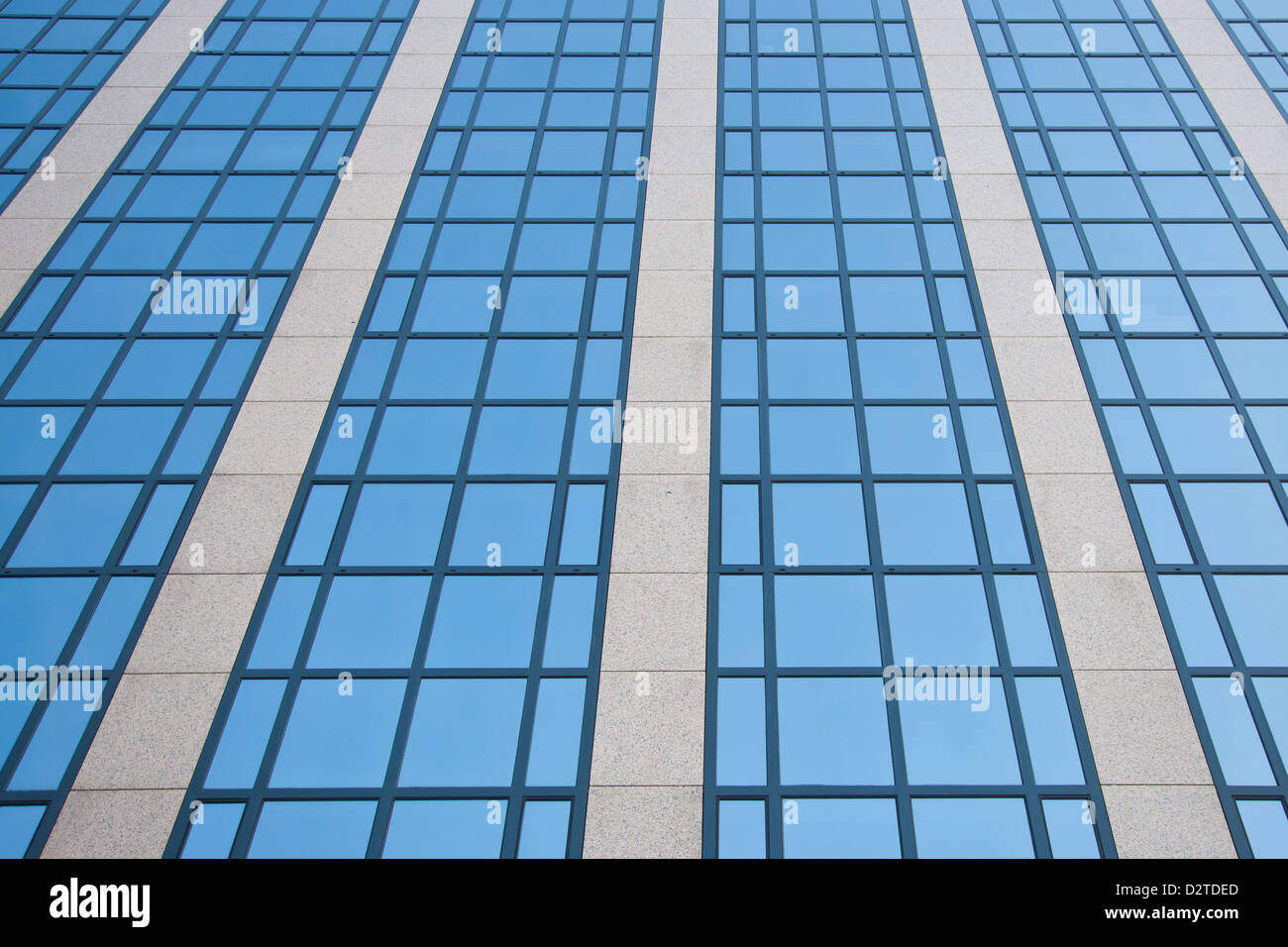 blue sky reflected in grid formed by windows Stock Photo - Alamy
