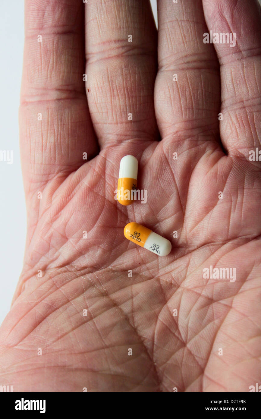 hand holding tablets Stock Photo - Alamy