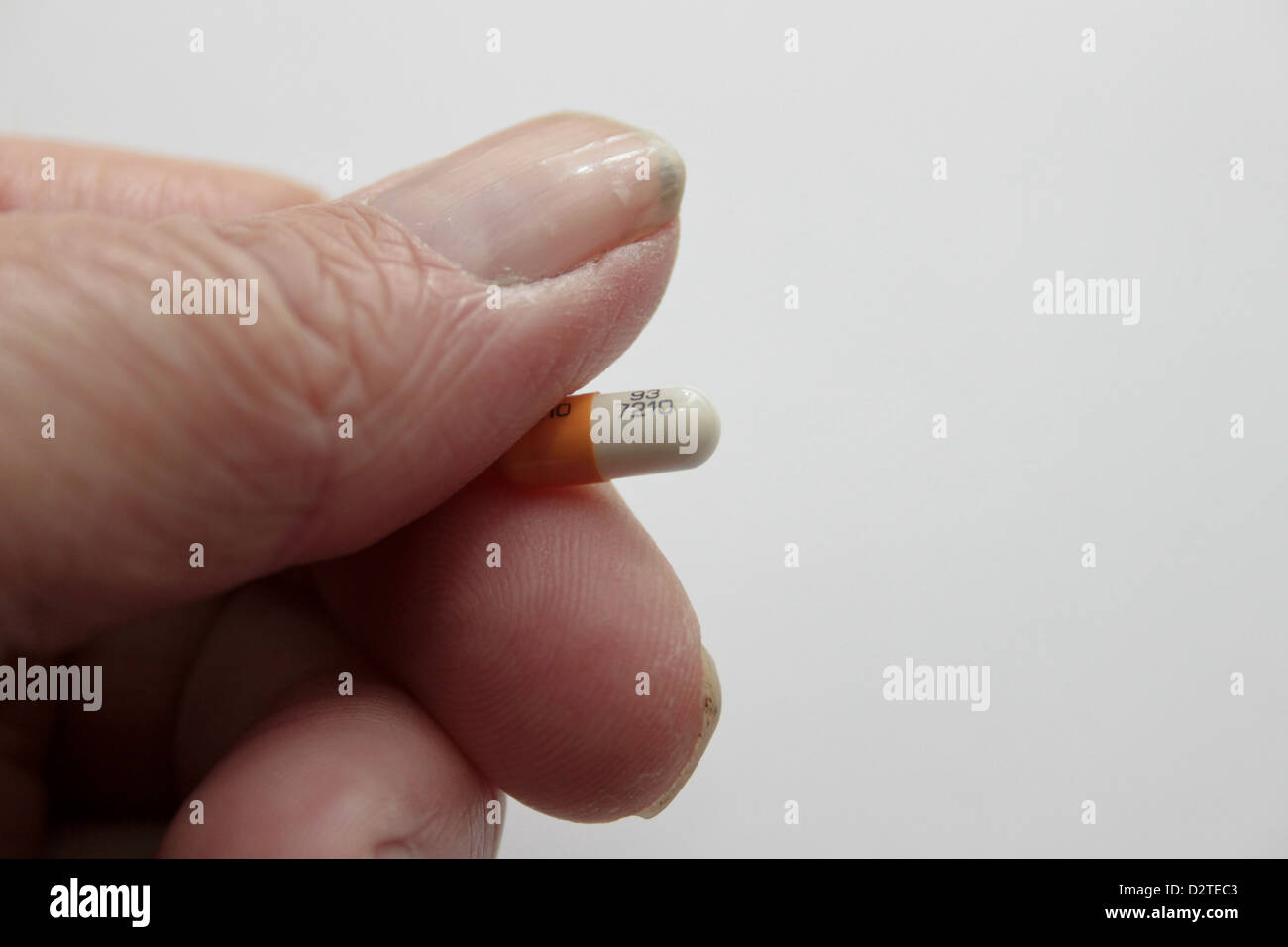 hand holding tablets Stock Photo - Alamy