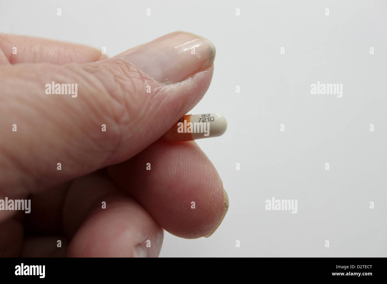 hand holding tablets Stock Photo - Alamy