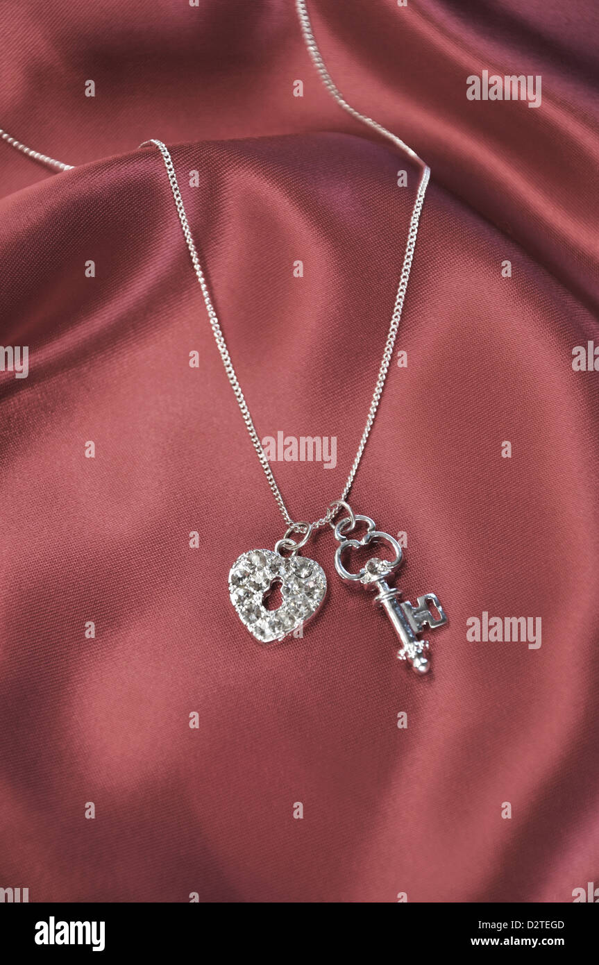 Chain and pendant - lock and key Stock Photo - Alamy