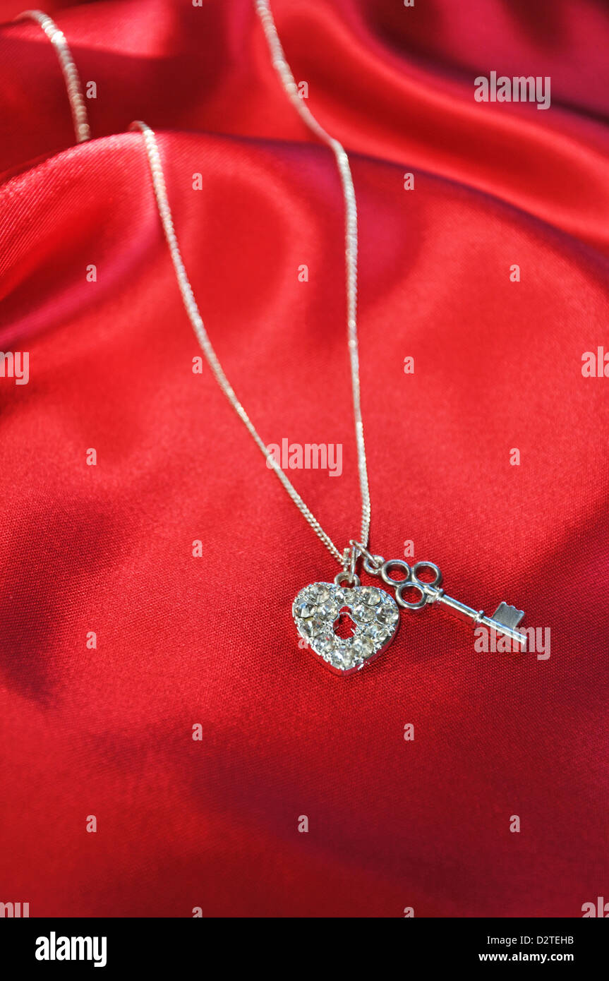 Chain and pendant - lock and key Stock Photo - Alamy
